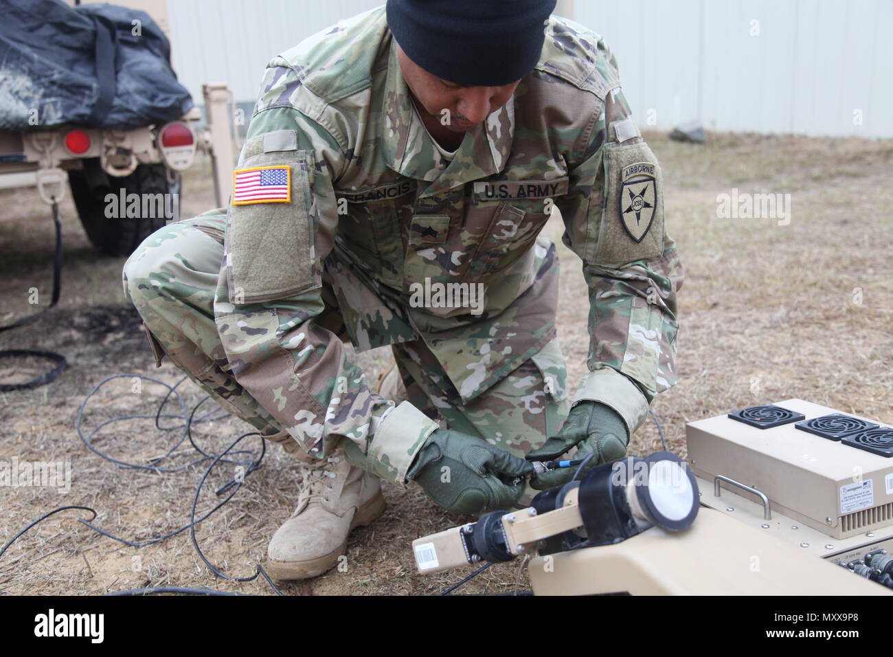 Sgt. Hans Francis, 4th Joint Communications Support Element, assembles ...