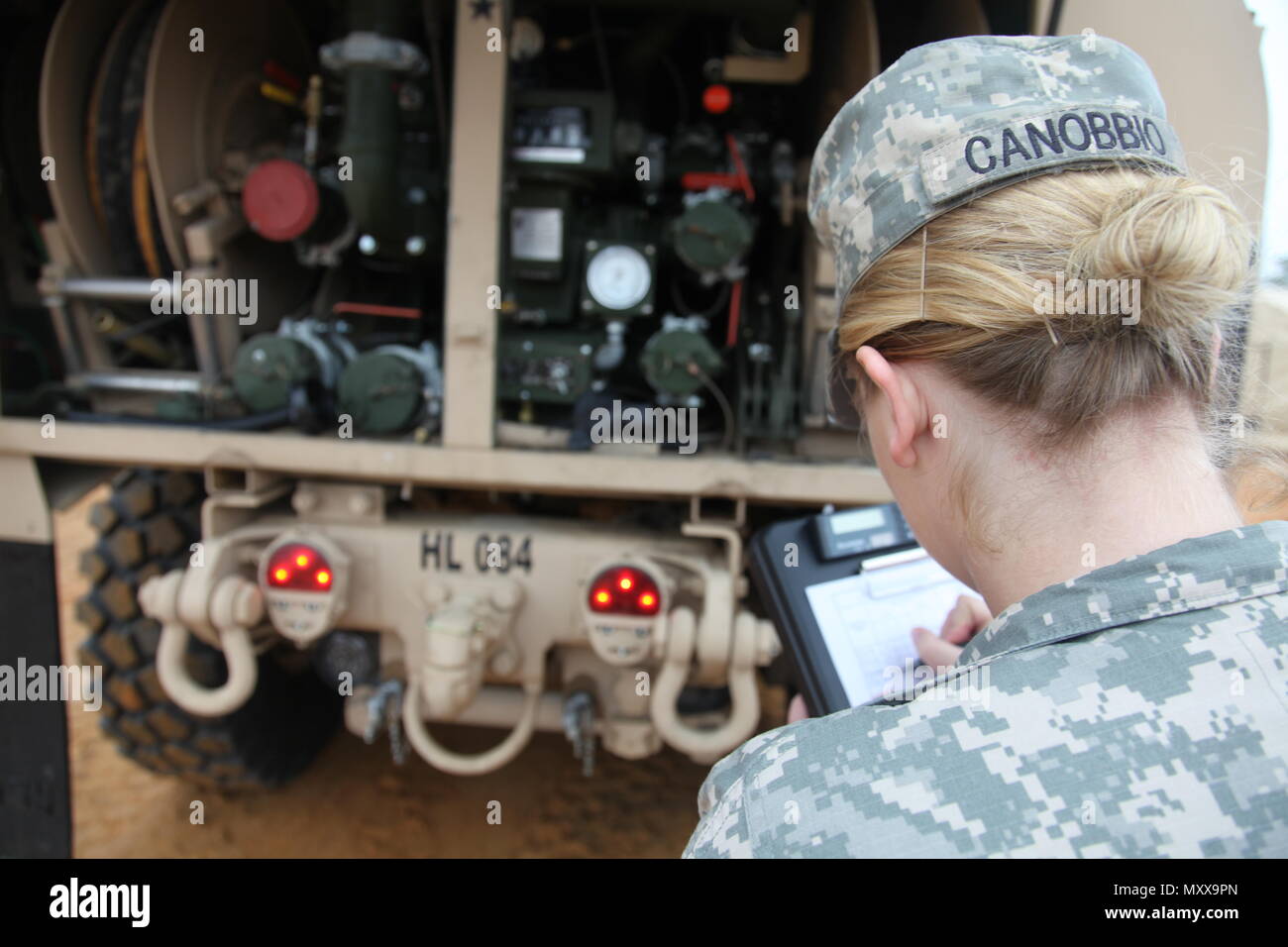 Spc. Caitlin Canobbio, 915th Transportation Company, completes ...