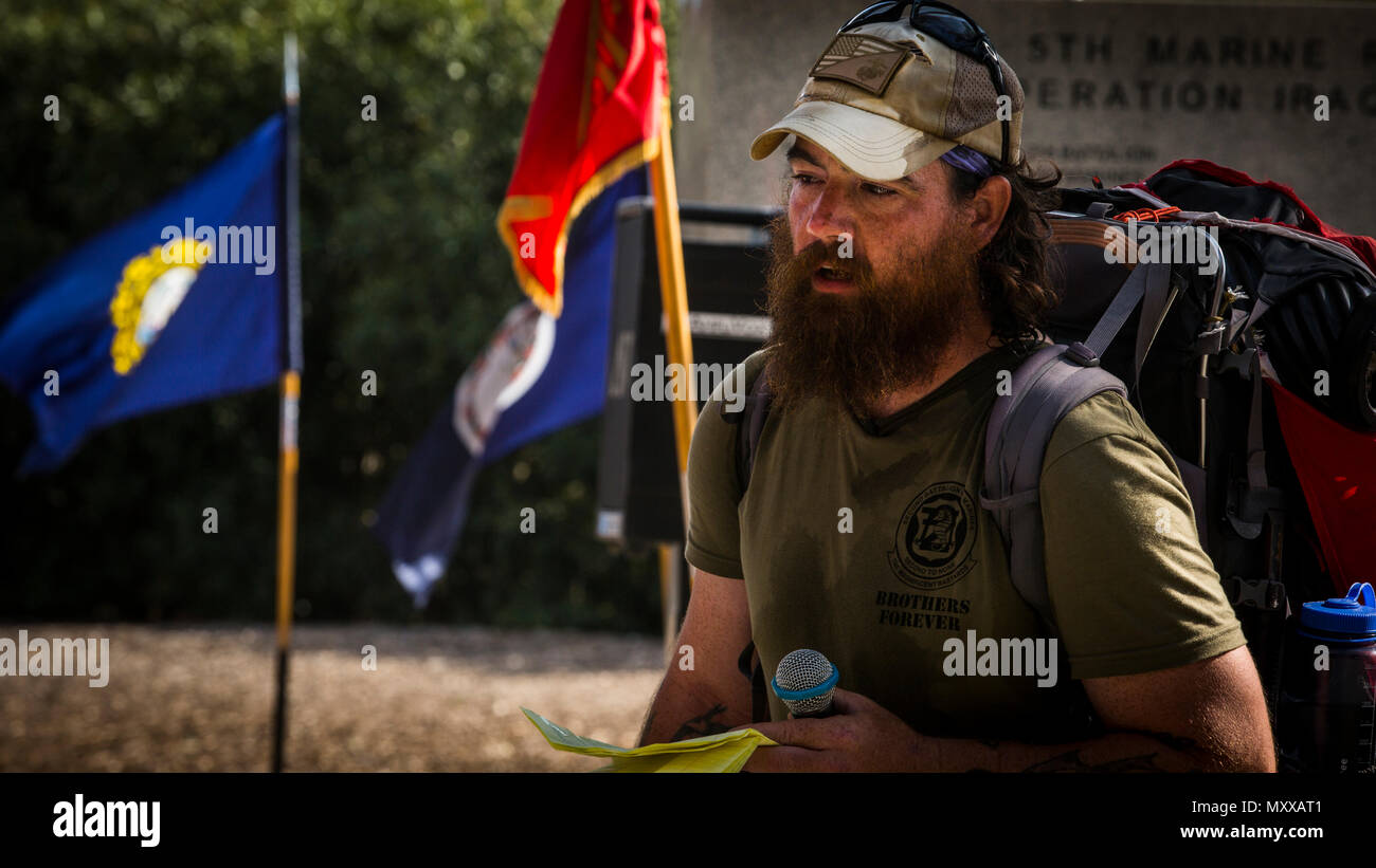Jon Hancock, a Marine veteran, gives a speech to fellow veterans ...