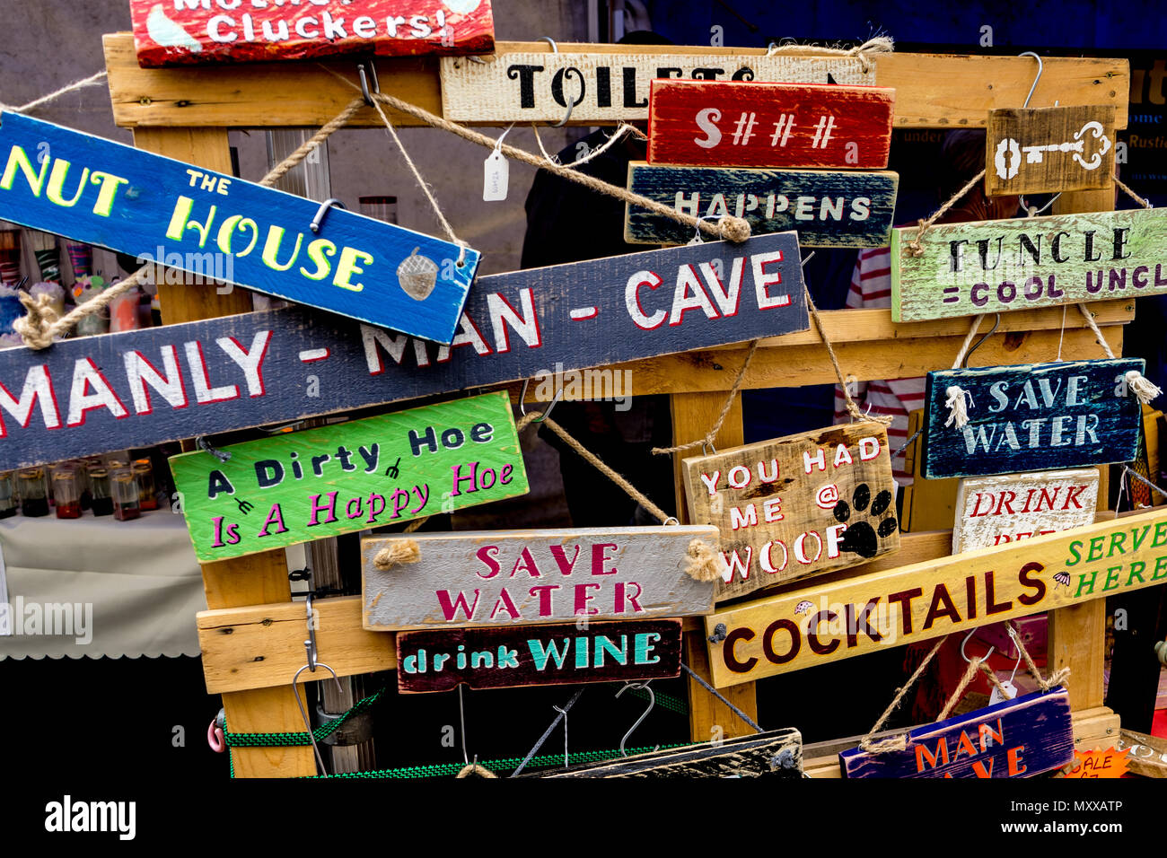 Funny colored retro wooden signs and plaques Stock Photo - Alamy