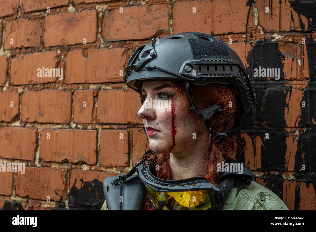 Powerful Woman Holding Gun. War Action Movie Style Stock Photo - Alamy
