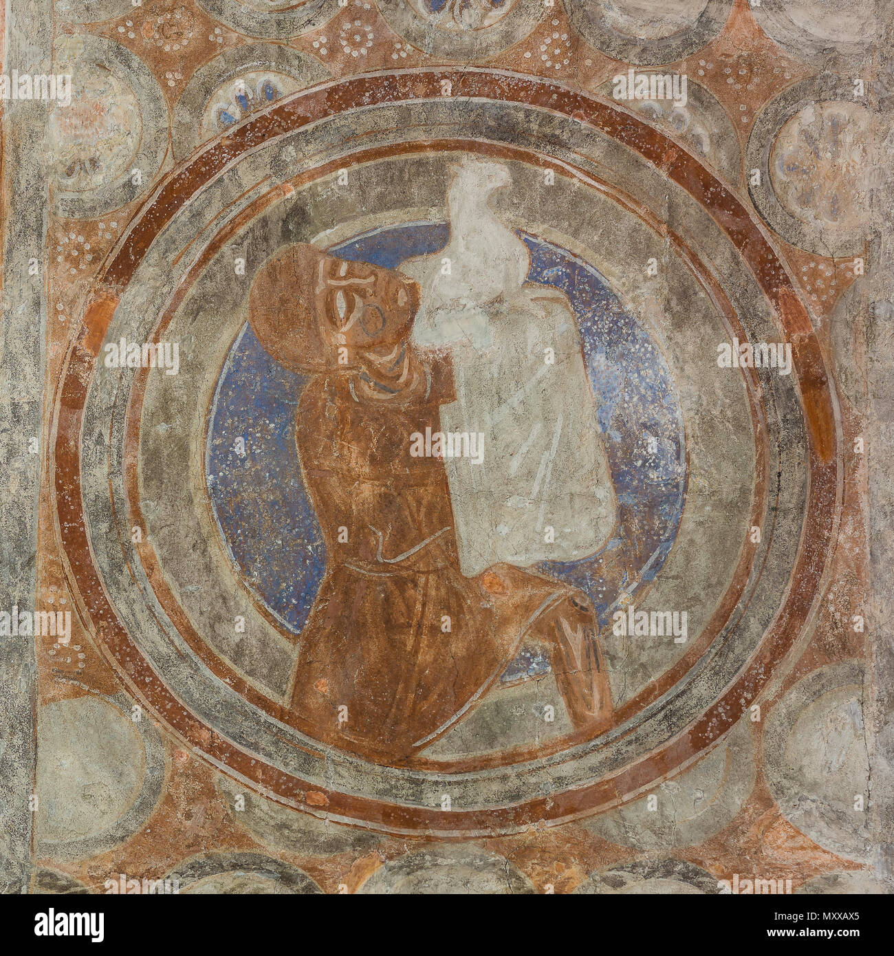 Abel holds a lamb in a white cloth and lifts it up to God. Romanesque ...