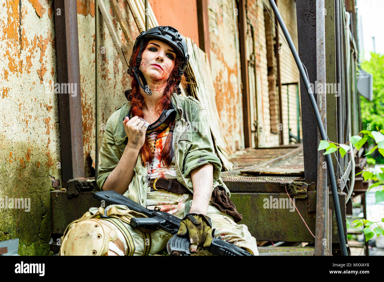 Powerful Woman Holding Gun. War Action Movie Style Stock Photo - Alamy