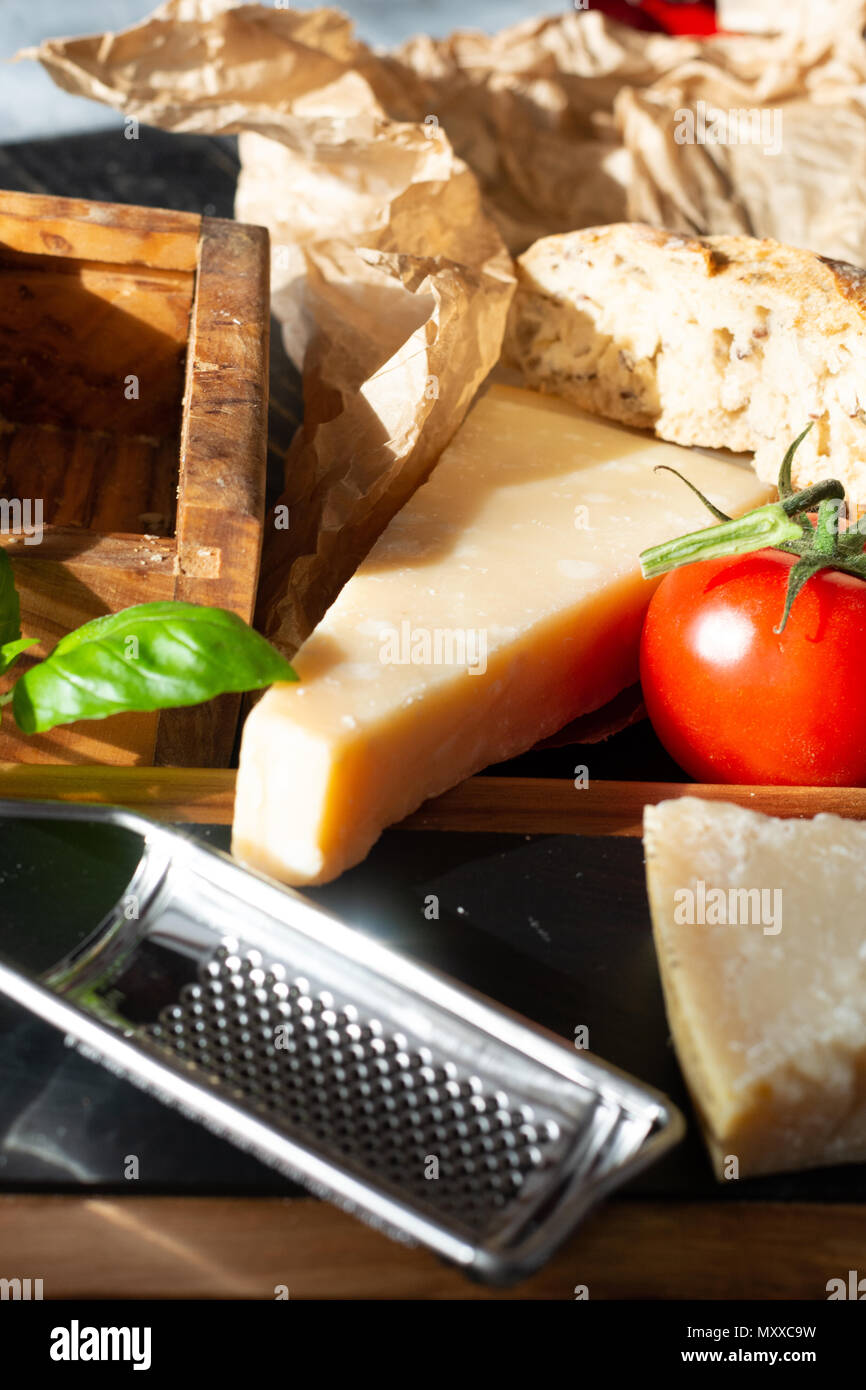 Traditional italian food - aged Italian parmesan hard cheese Parmigiano ...