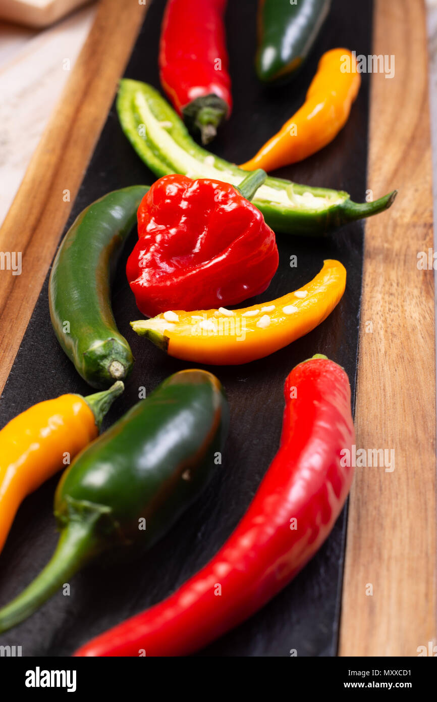 Colorful fresh hot Mexican chili peppers in assortment Stock Photo - Alamy