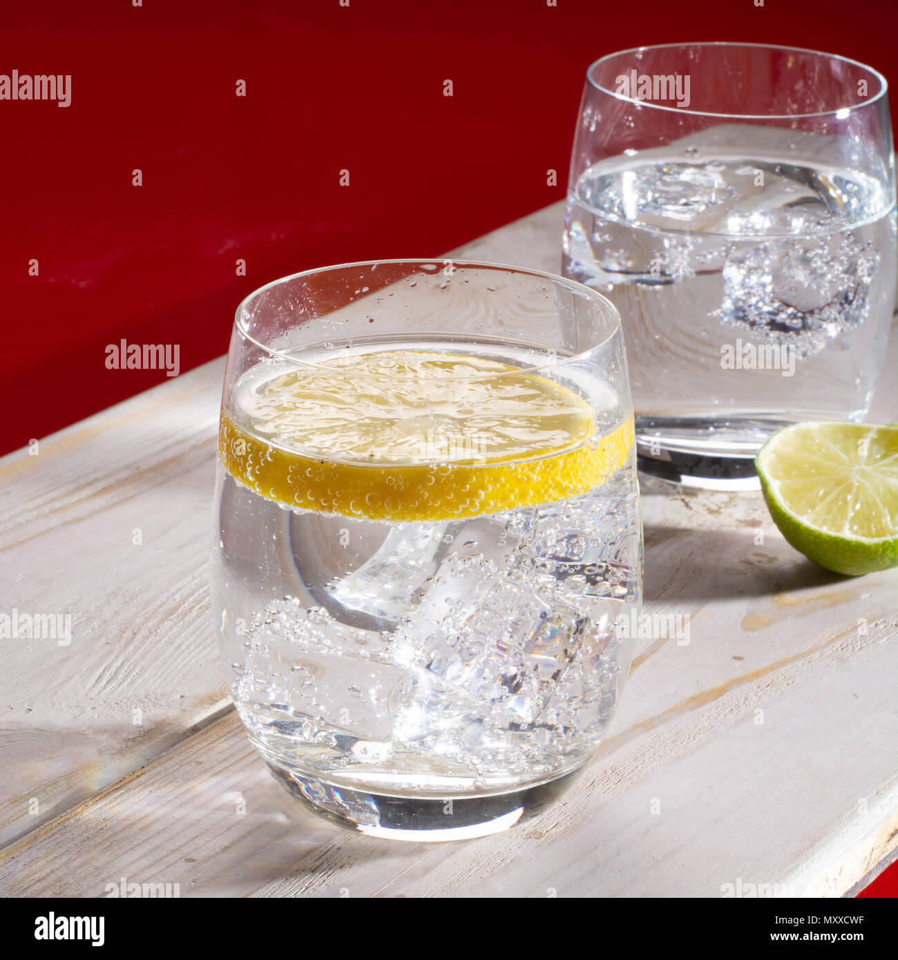 Sparkling mineral drink water in glasses served on table with lemon copy space Stock Photo - Alamy