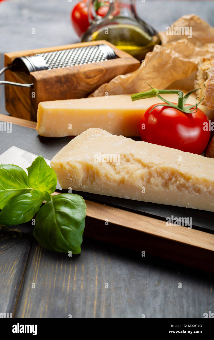 Traditional italian food - aged Italian parmesan hard cheese Parmigiano ...