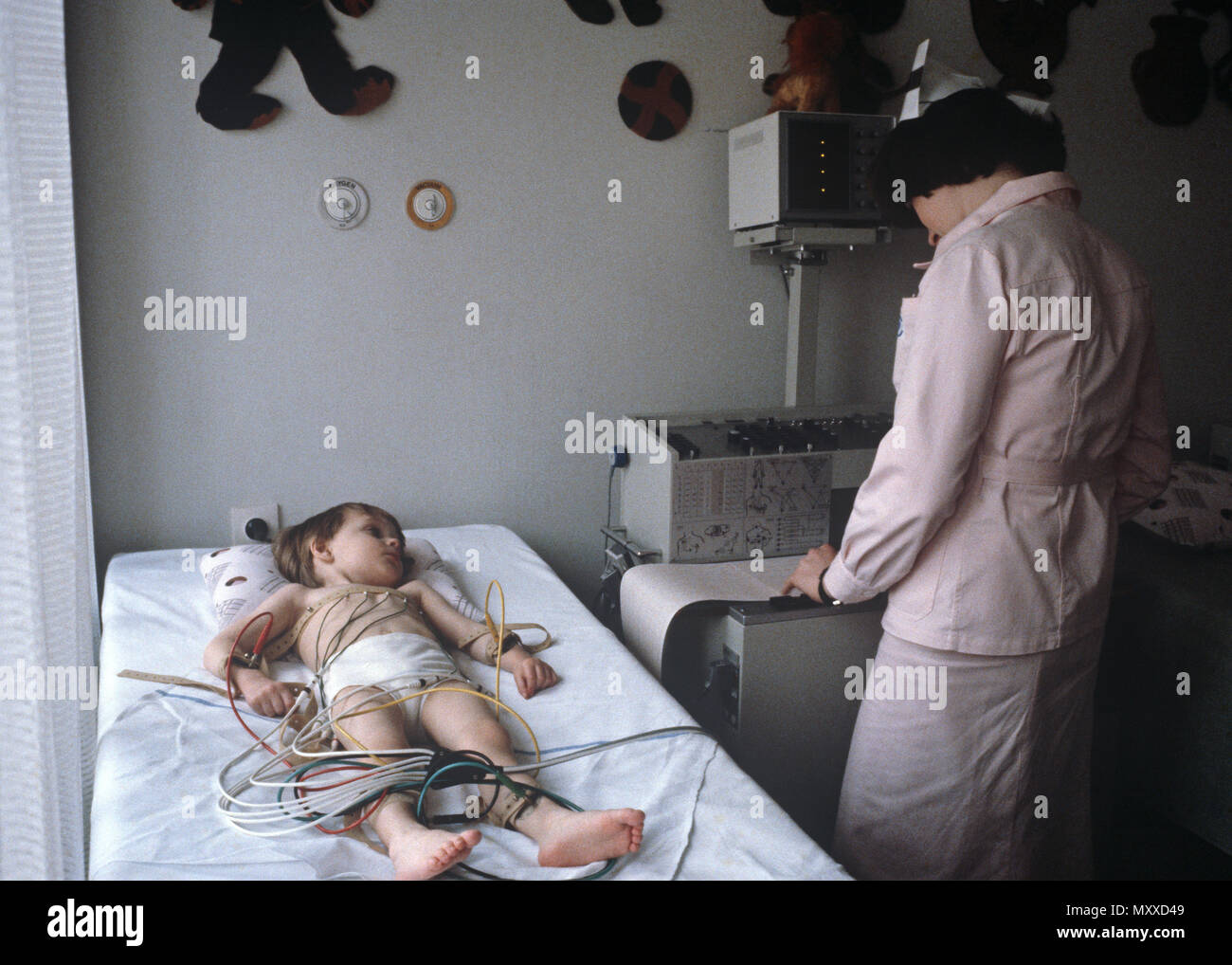 Taking an, Electrocardiogram, ECG, of a child patient in Polish ...