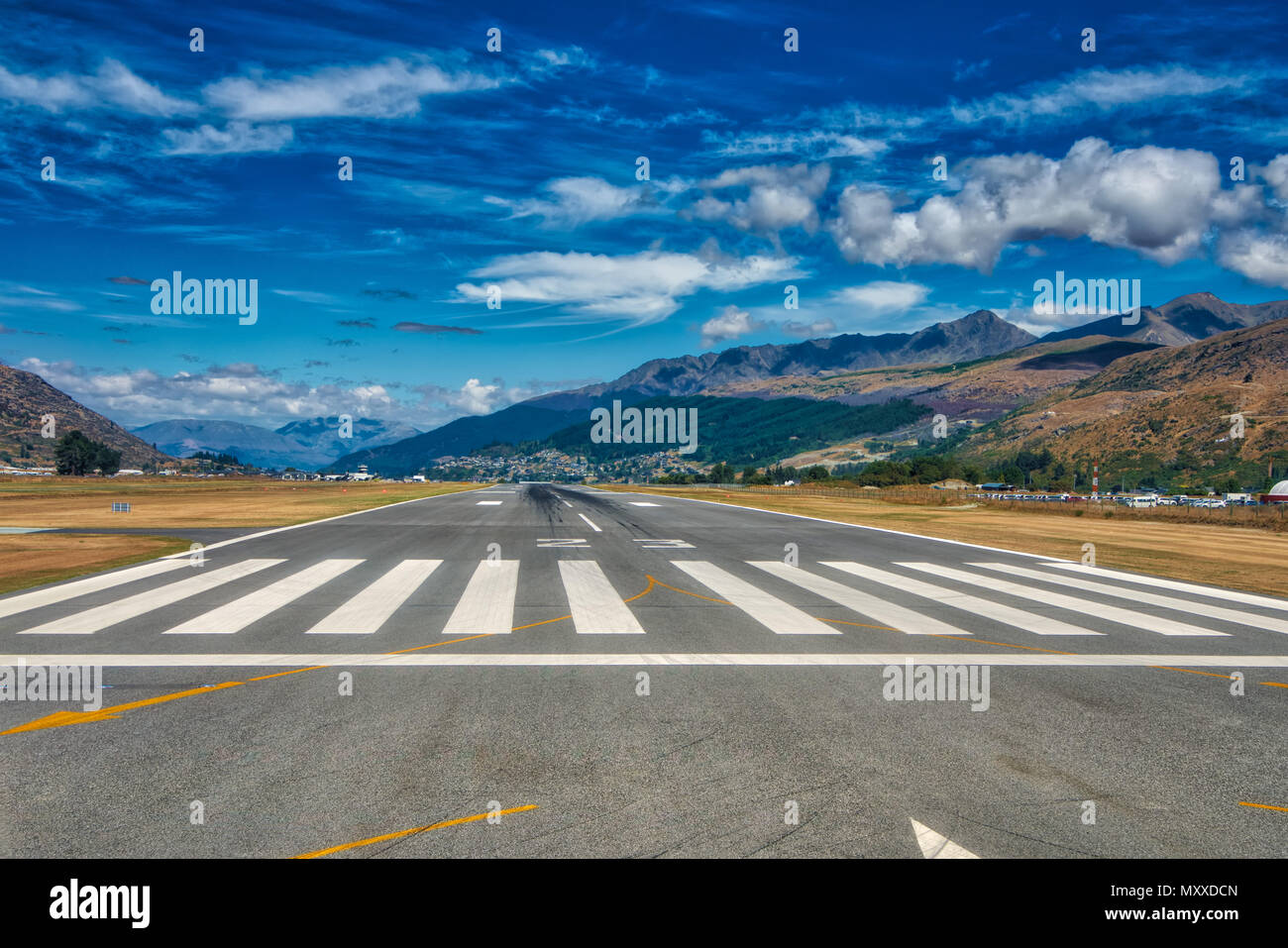 January, 2018: Queenstown airport runway with mountains in the ...