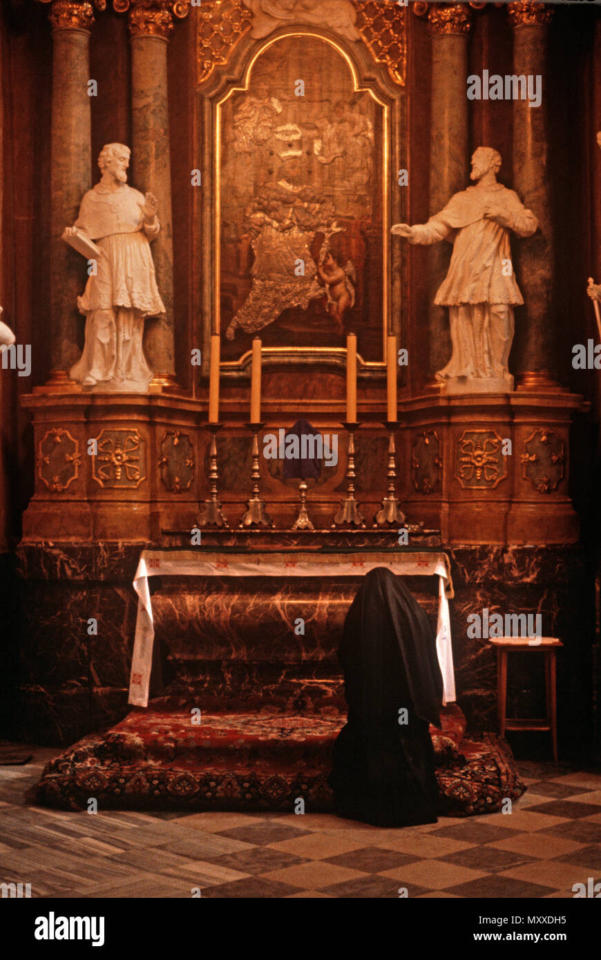 Nun praying in Jasna Gora Monastery, Czestochowa, Poland Stock Photo ...