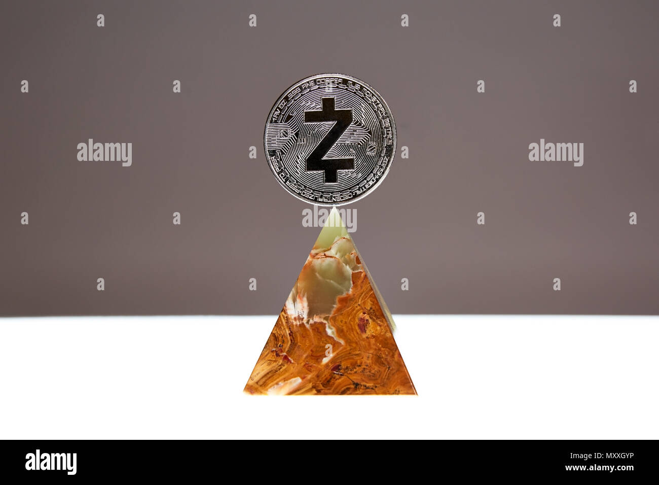 ZCash Coin sitting a top a translucent Onyx Stone. Stone symbolizes ...