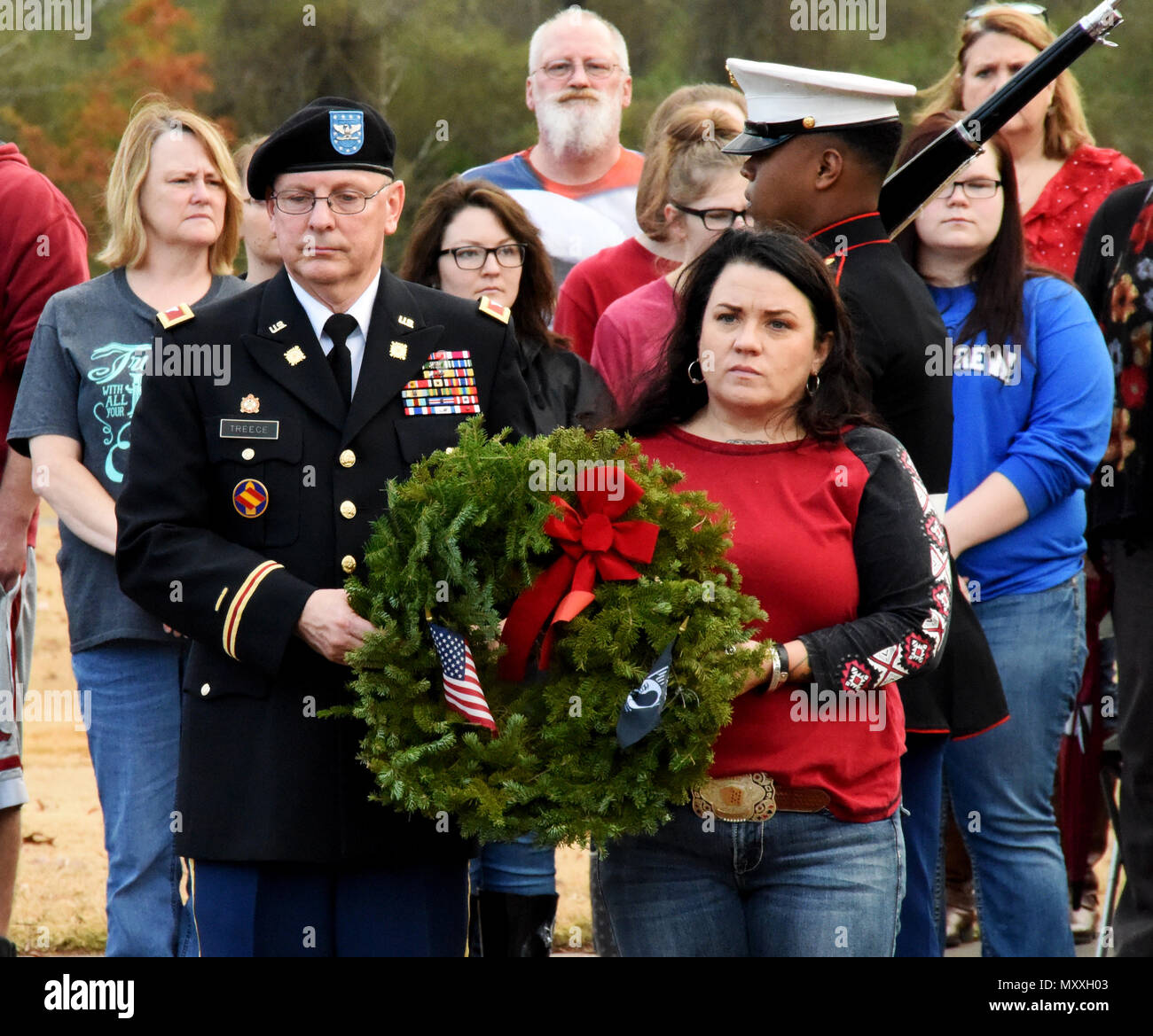 Col. James Treece, Post Commander of Fort Chaffee JMTC, accompanies Ms ...
