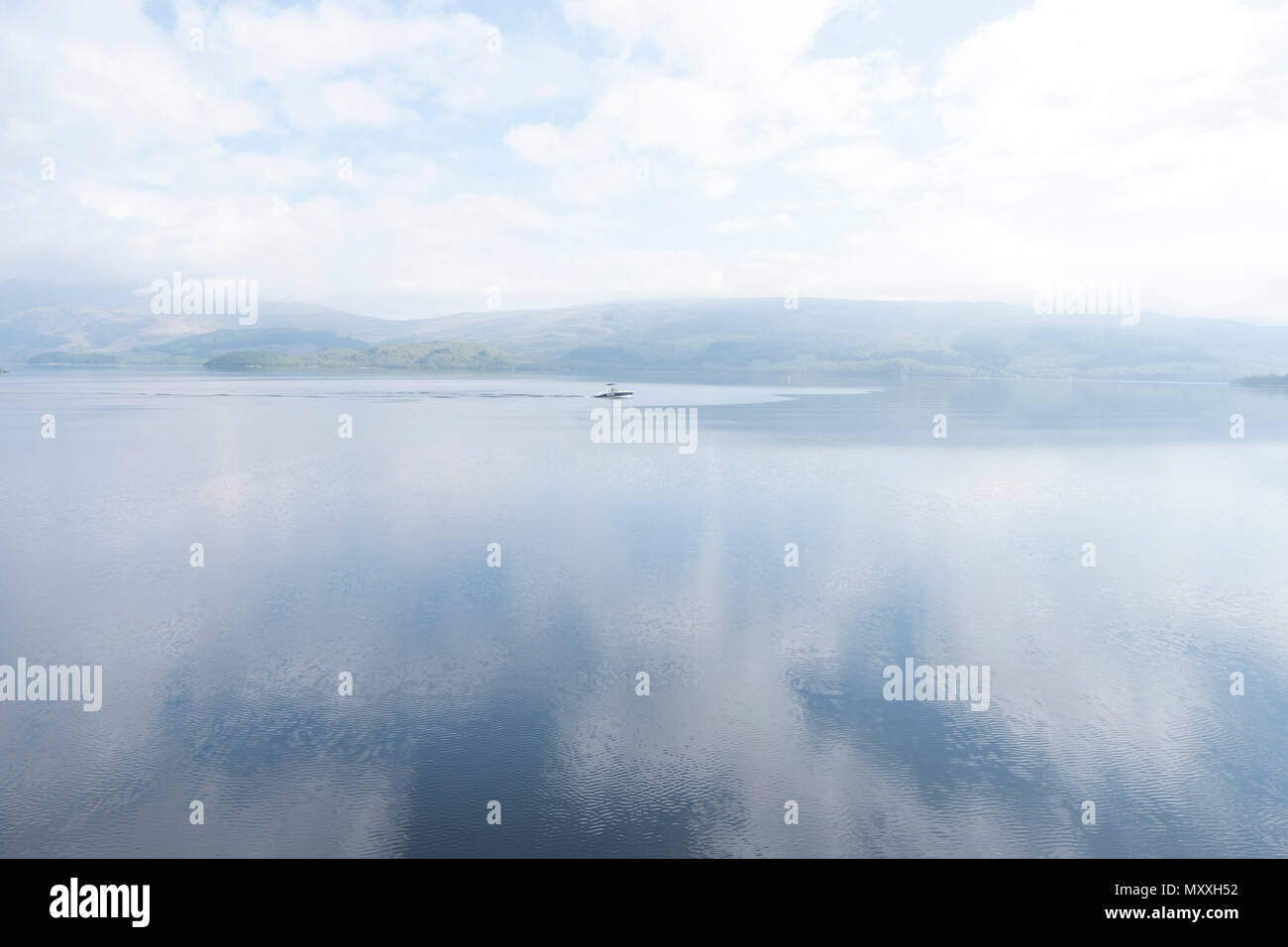 Scotland loch lake reflections clouds hi-res stock photography and ...