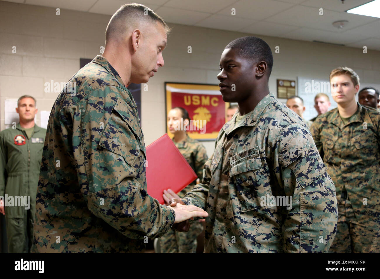 Brig. Gen. Matthew Glavy, left, congratulates the newly promoted Lance ...