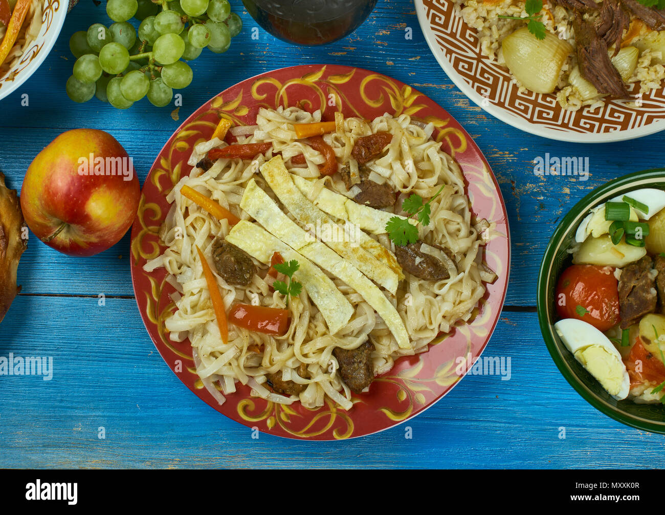 Uzbek Qovurma lagmon , Traditional assorted dishes, Top view. Central ...