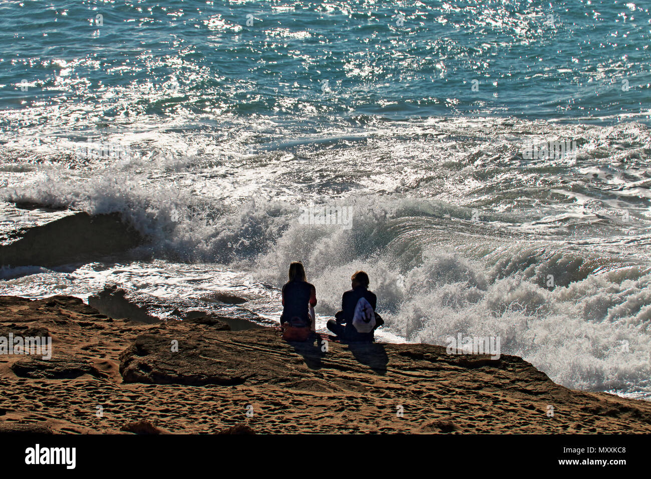 Woman cliff ocean storm hi-res stock photography and images - Alamy
