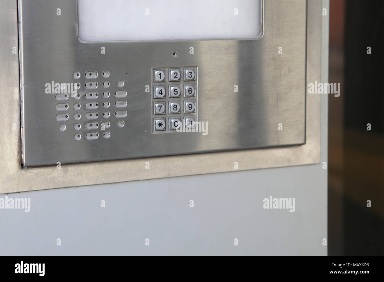 Close up of building intercom Stock Photo - Alamy