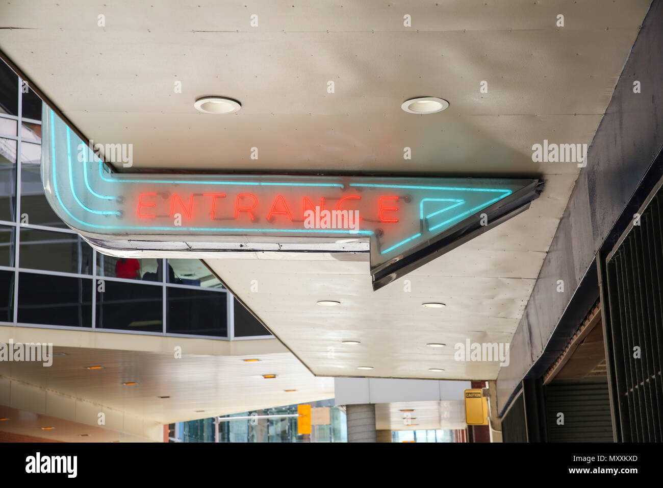 Neon entrance sign Stock Photo - Alamy