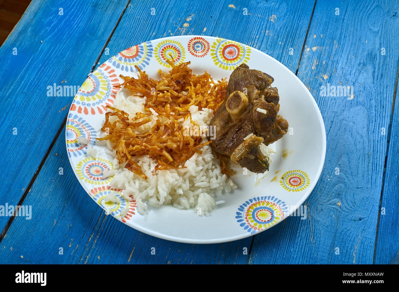 Qozi Lamb - Traditional Middle Eastern rice cooked with peas, carrots ...