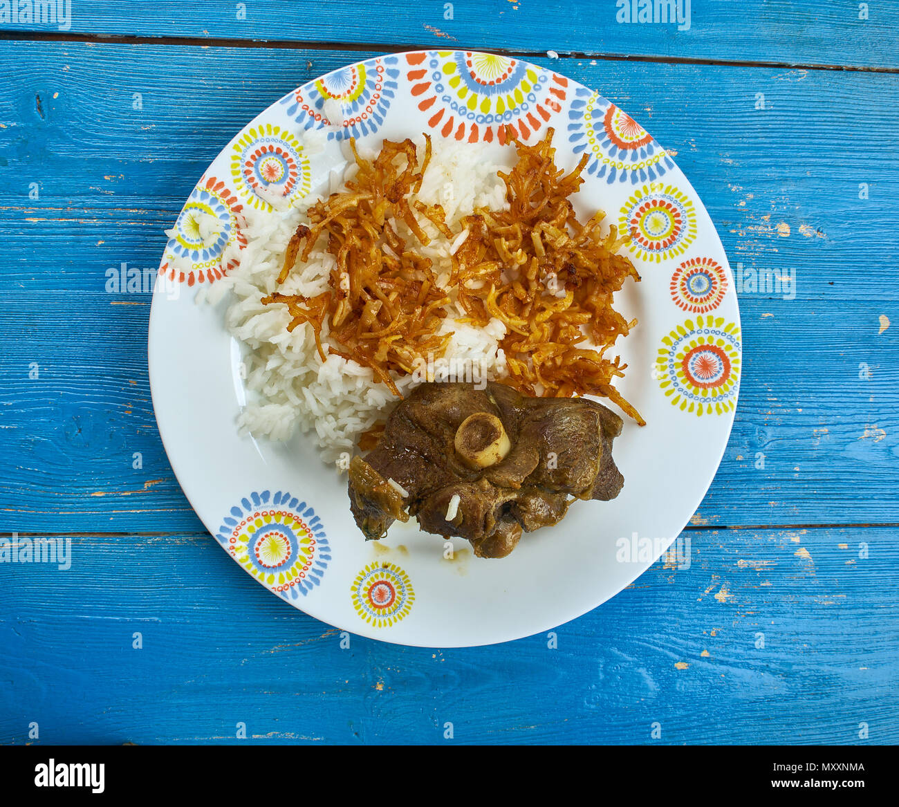 Qozi Lamb - Traditional Middle Eastern rice cooked with peas, carrots ...