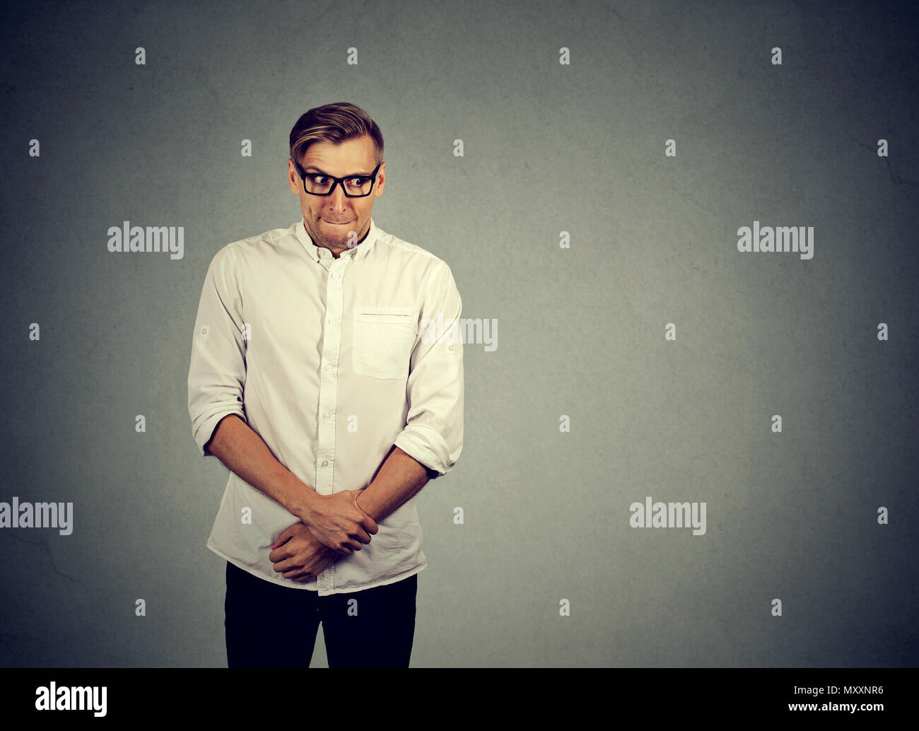 Nervously holding her shirt hi-res stock photography and images - Alamy