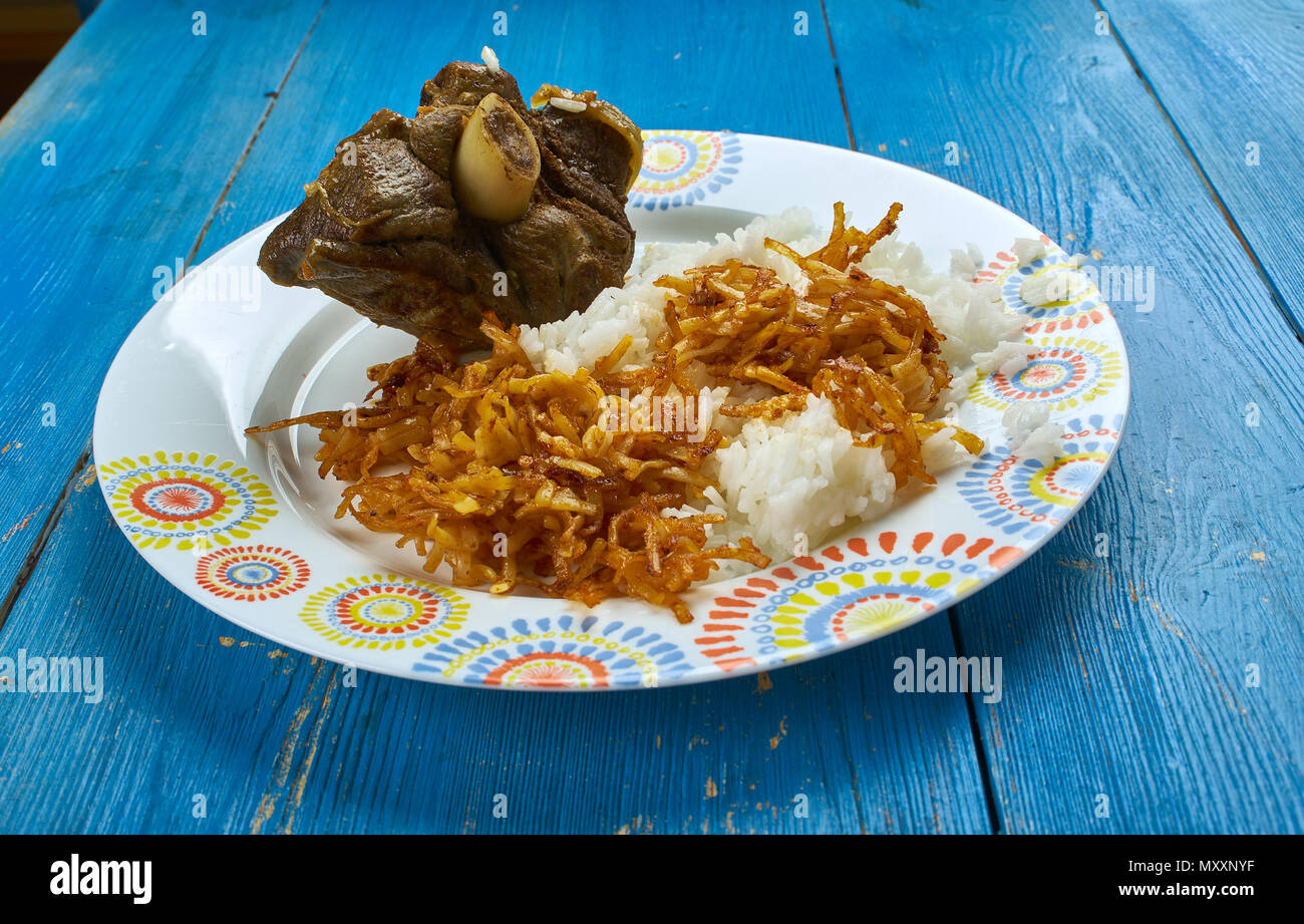 Qozi Lamb - Traditional Middle Eastern rice cooked with peas, carrots ...