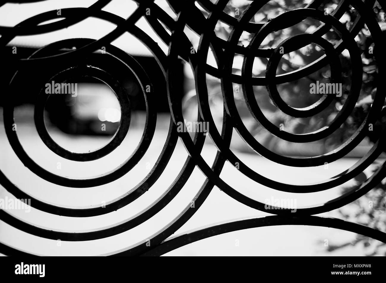 Forged metal fence. Drawing circles. Decorative fence Stock Photo - Alamy