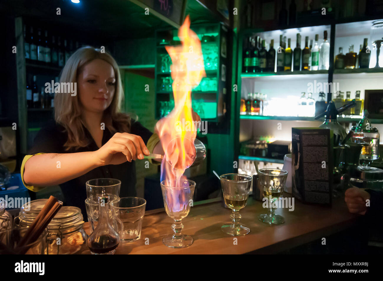 PRAGUE, CZECH REPUBLIC. January 25, 2015. An unknown bartender girl in ...