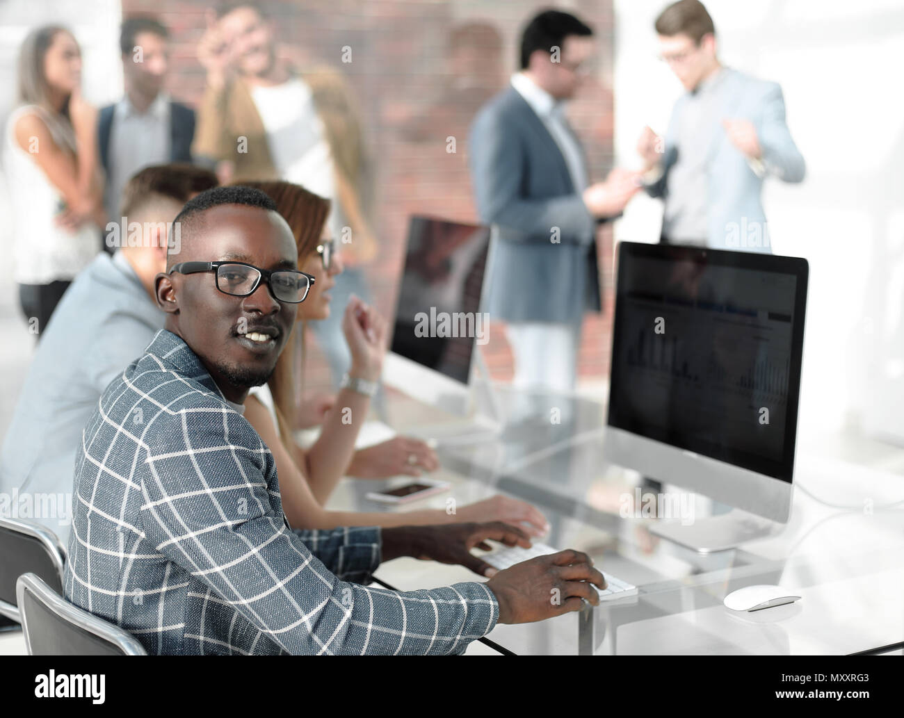 portrait of a successful employee of the company Stock Photo - Alamy