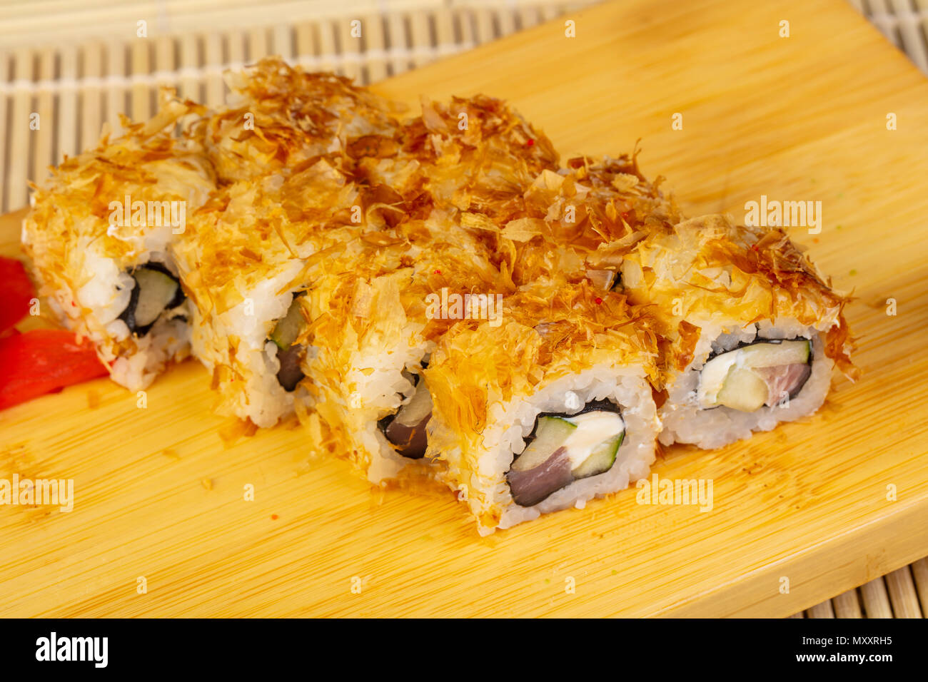 Delicious bonito sushi rolls with ginger Stock Photo - Alamy