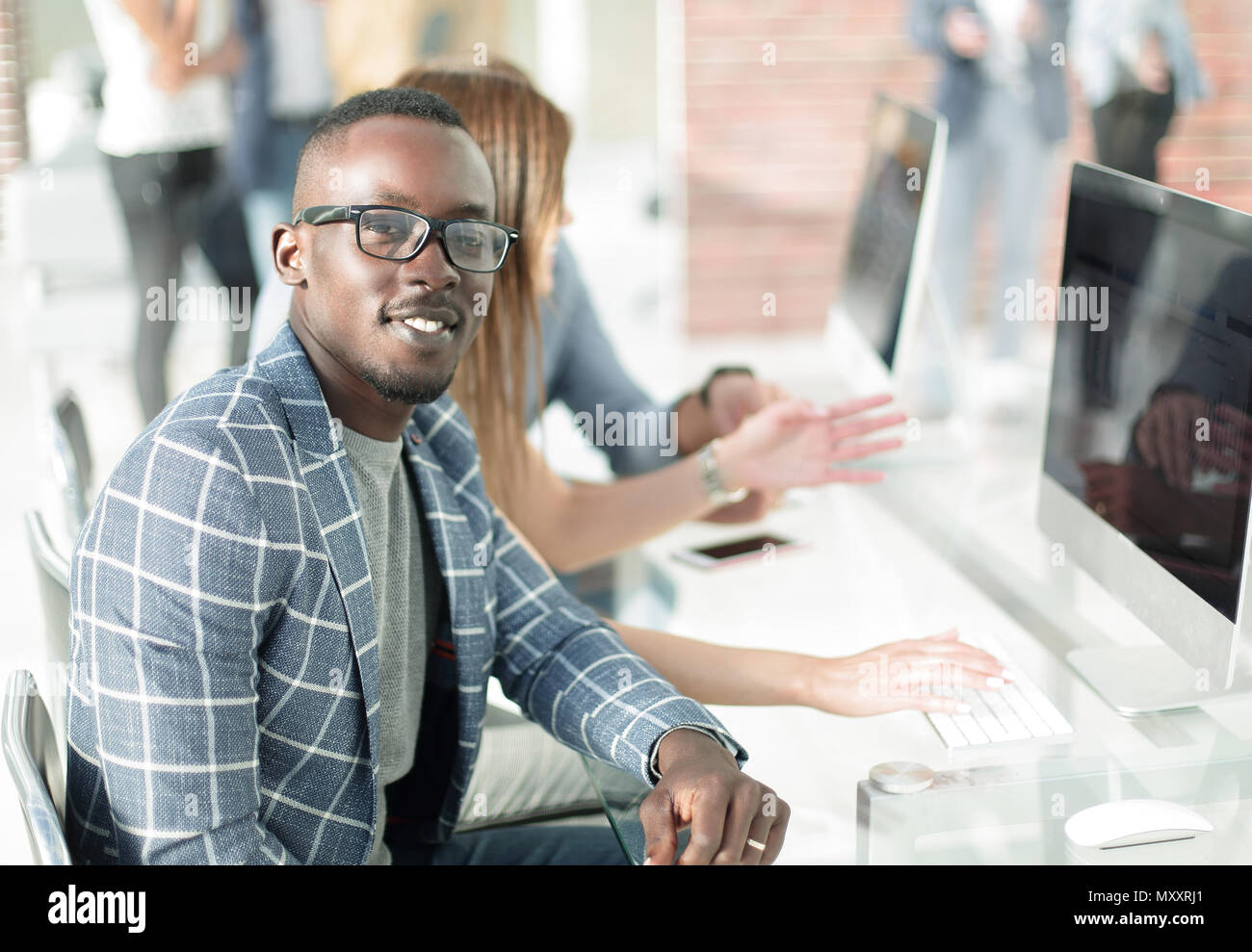 employee of the company in the workplace Stock Photo - Alamy