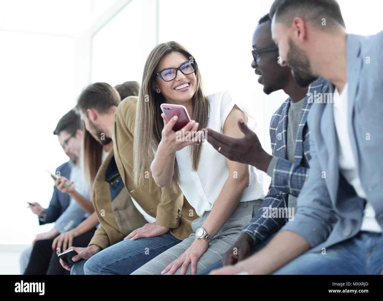group of young people with smartphones Stock Photo - Alamy