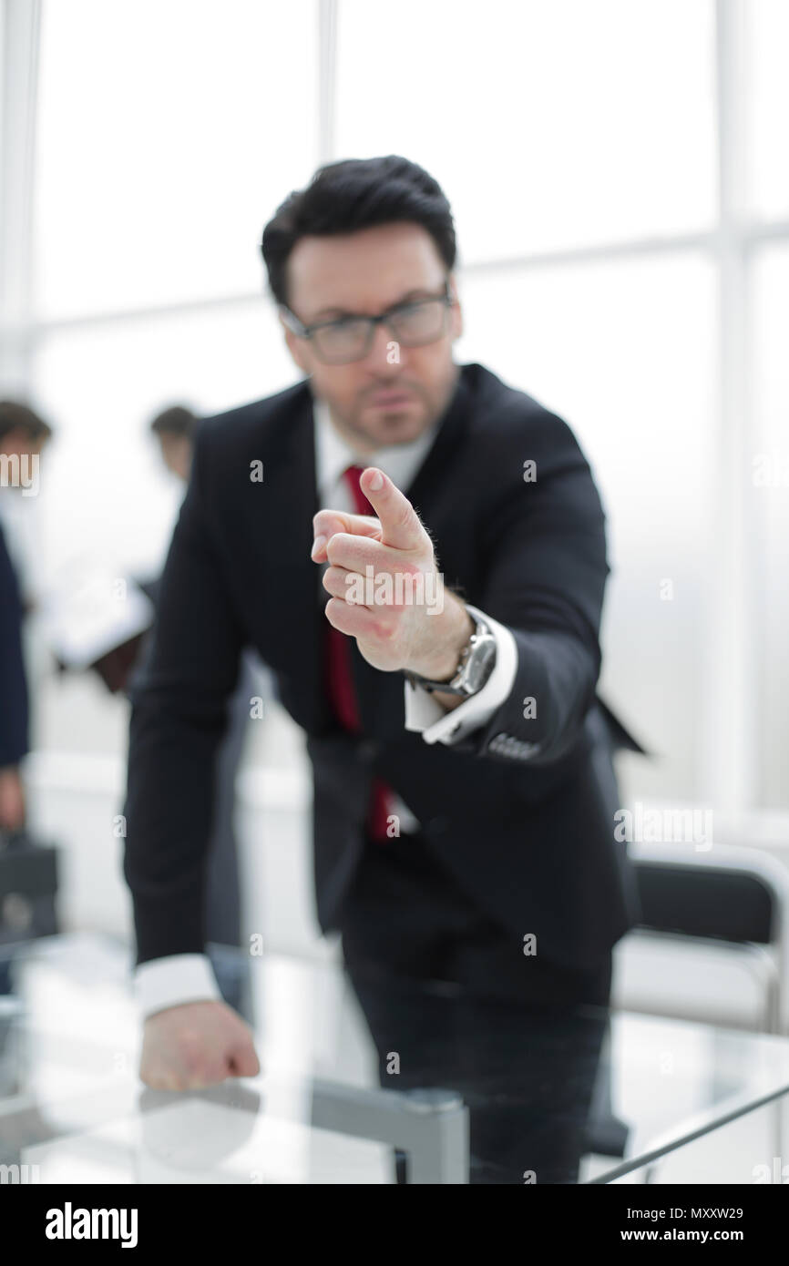 strict business owner pointing finger at you Stock Photo - Alamy