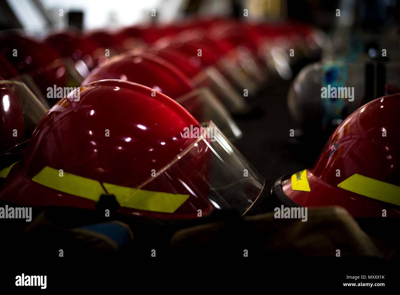 Firefighting equipment is arranged during a ship‑wide Damage Control ...