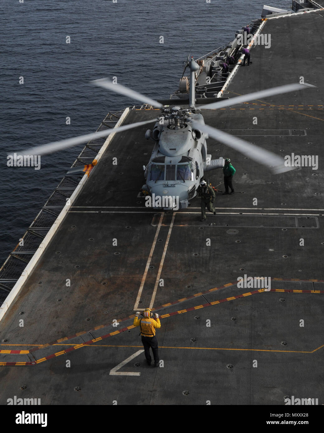PACIFIC OCEAN (Dec. 12, 2016) An MH-60R Sea Hawk helicopter, from the ...