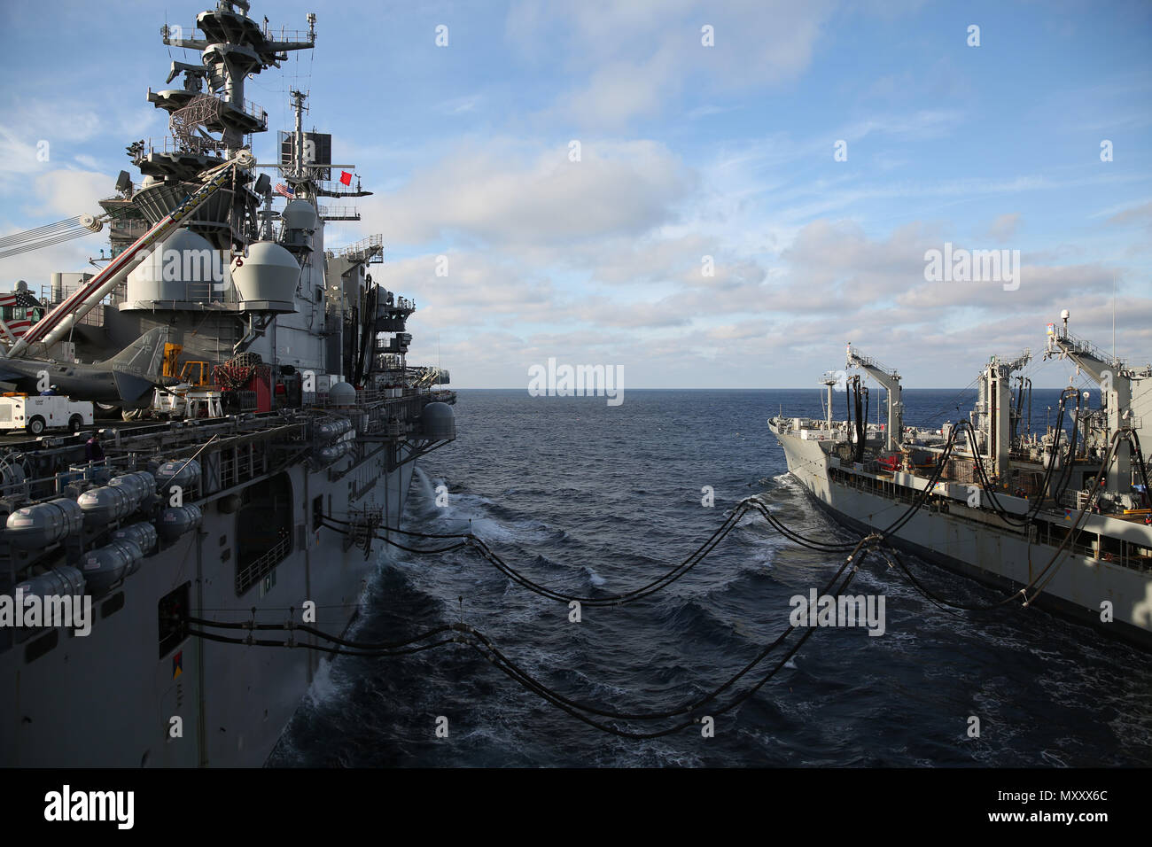 The fleet replenishment oiler USNS Big Horn (T-AO 198) refuels the ...