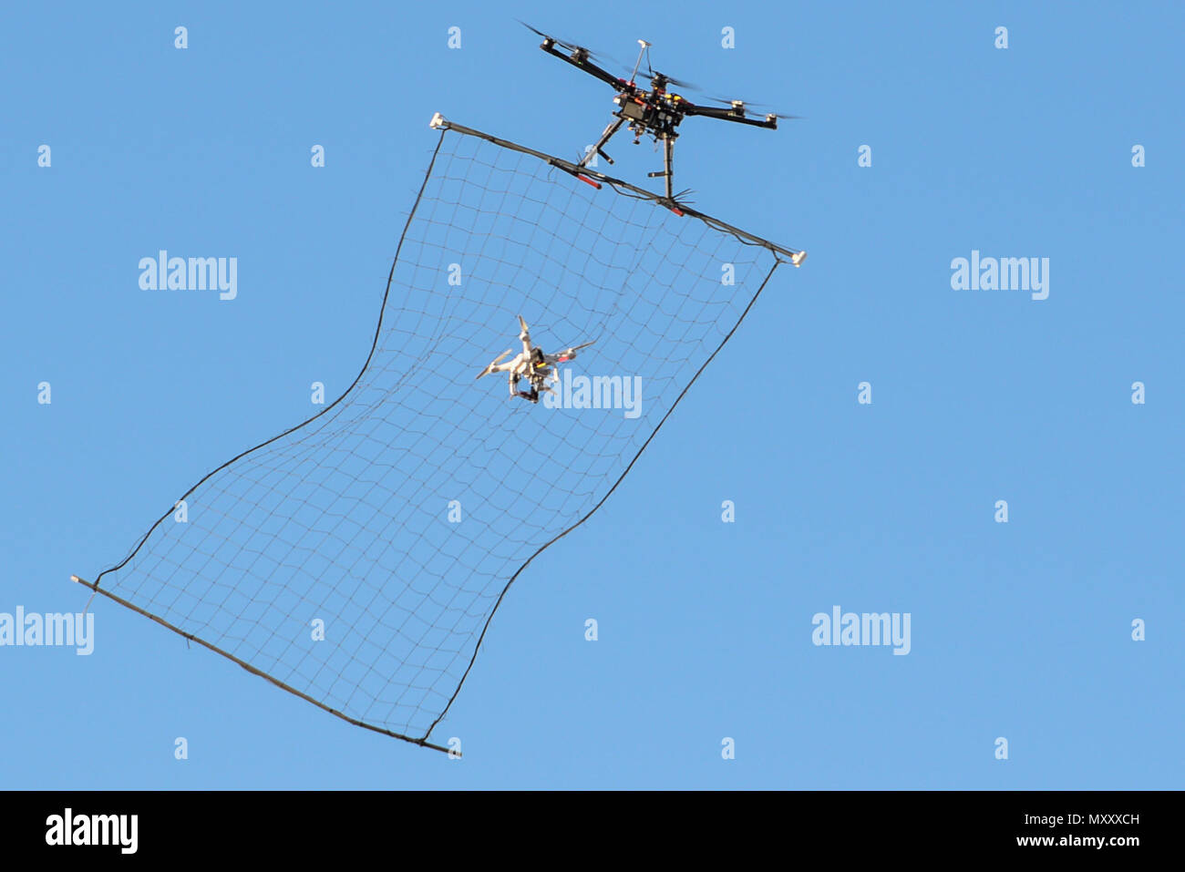 A hunter-killer drone with attached net, part of the unmanned aerial ...