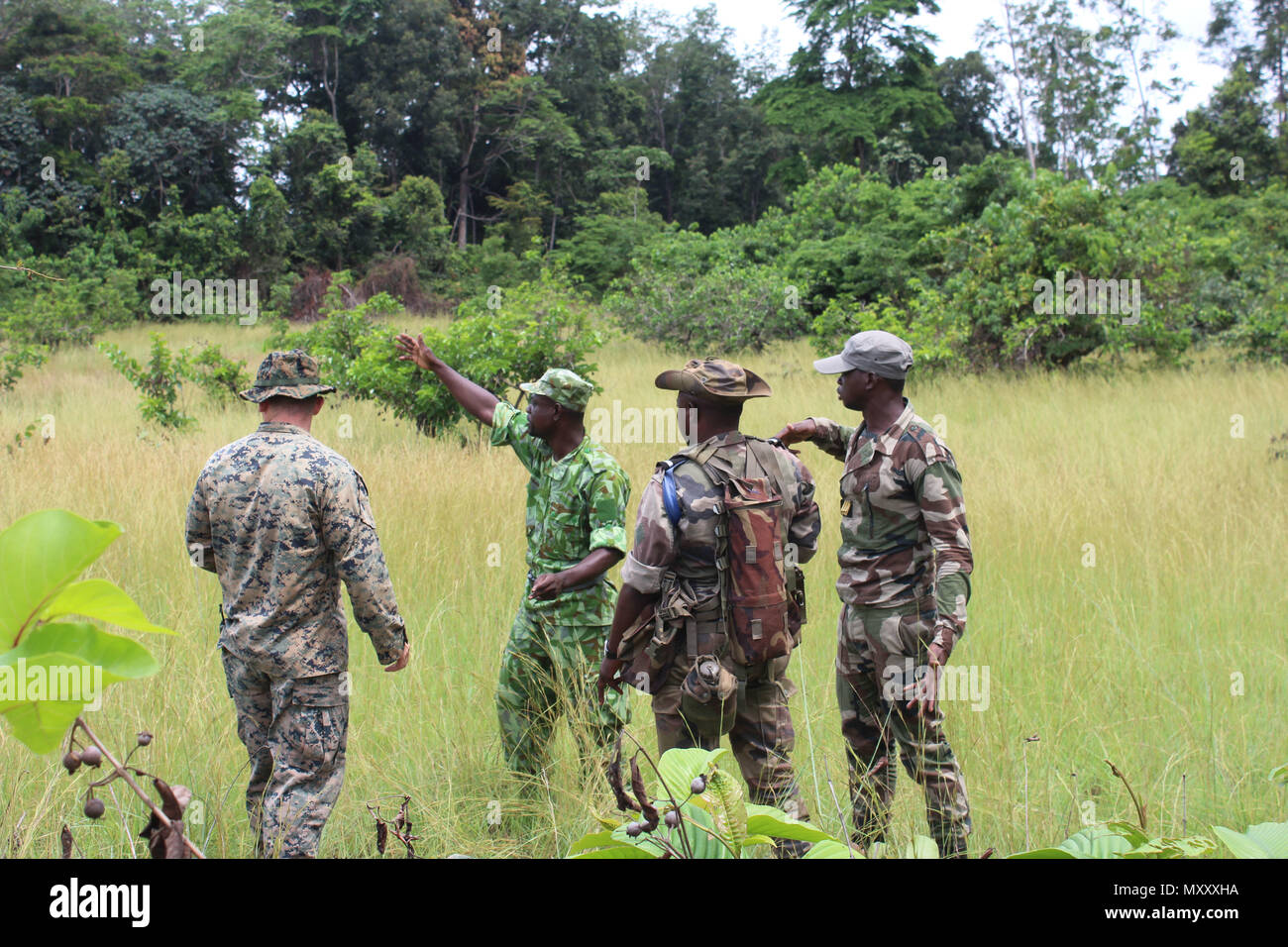 A U.S. Marine, left, oversees a member of the Gabonese Agency for ...