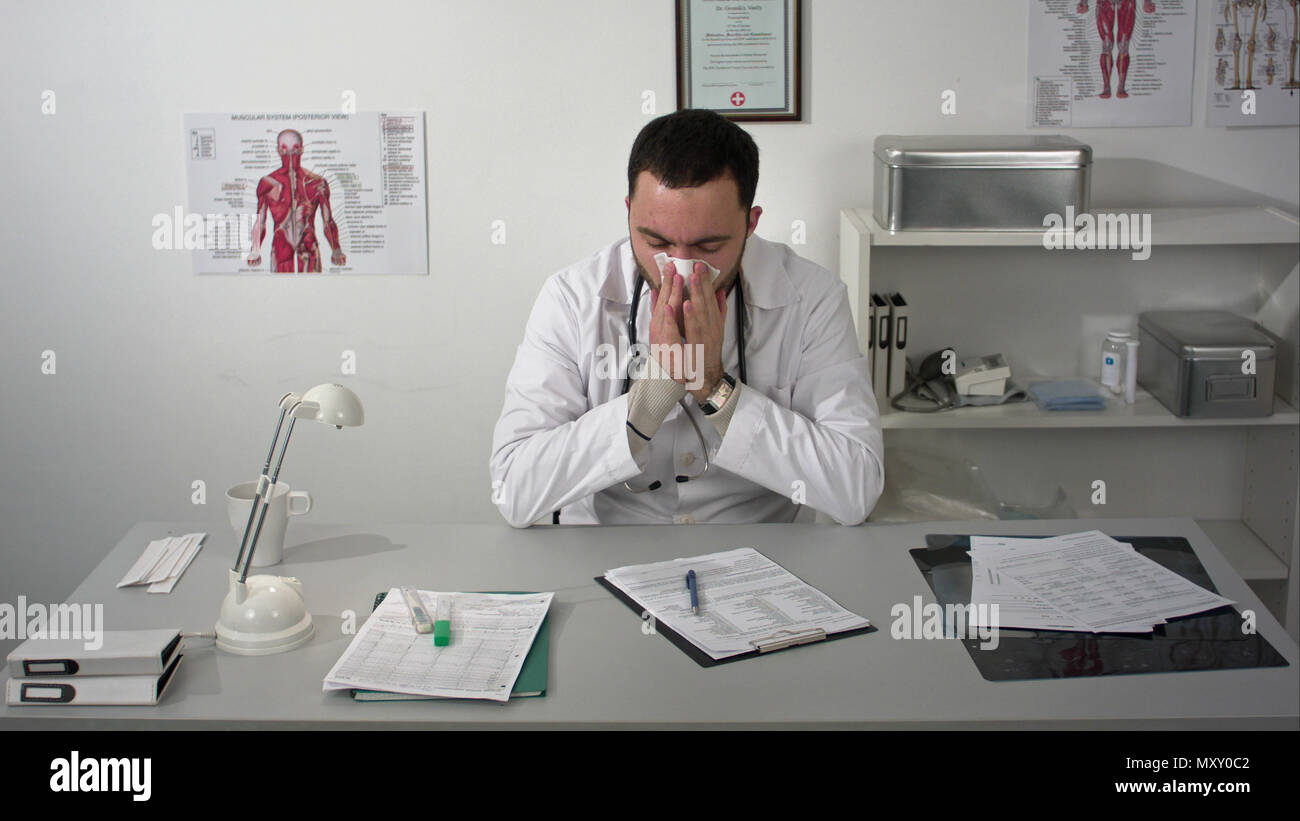 Sick doctor sneeze and cough Stock Photo - Alamy