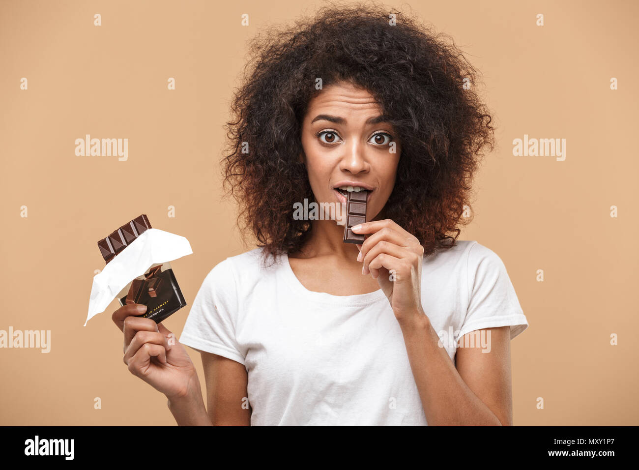 Woman Eating Chocolate Bar
