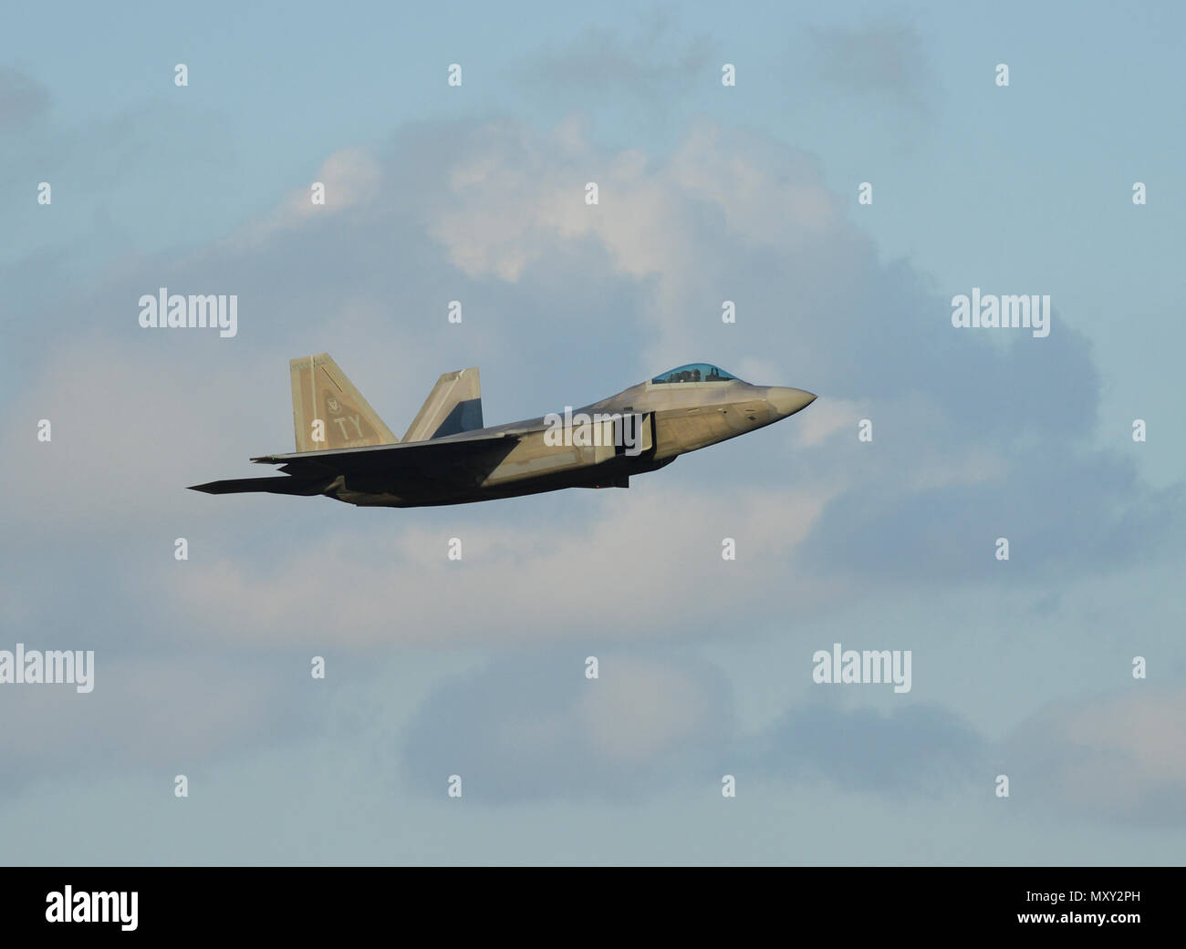 A U.S. Air Force F-22 Raptor flies over Tyndall Air Force Base, Florida ...