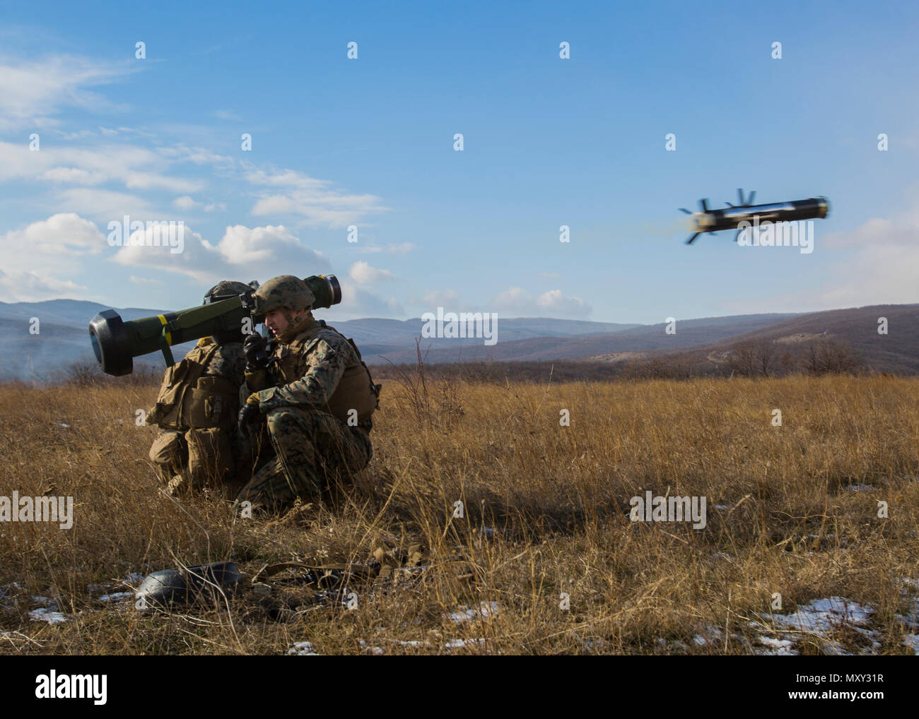 U.S. Marines fire the FGM-148 Javelin Missile during a live-fire range ...
