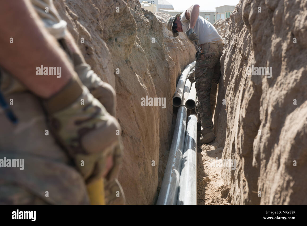 Staff Sgts. Alex Russ, (left) and Sean O’Brien, Engineering and ...