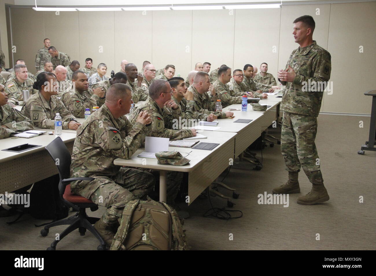 Lt. Col. Chad Roehrman, standing, commander, 3rd Battalion, 353rd ...