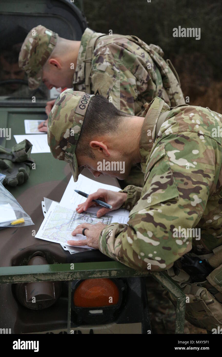 U.S. Army Sgt. 1st Class Jason E. Gordon, front, and Sgt. 1st Class ...