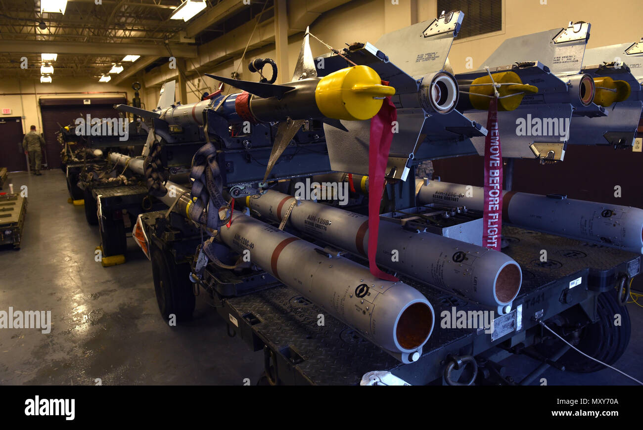 Racks of training missiles are stored in a holding area during ...