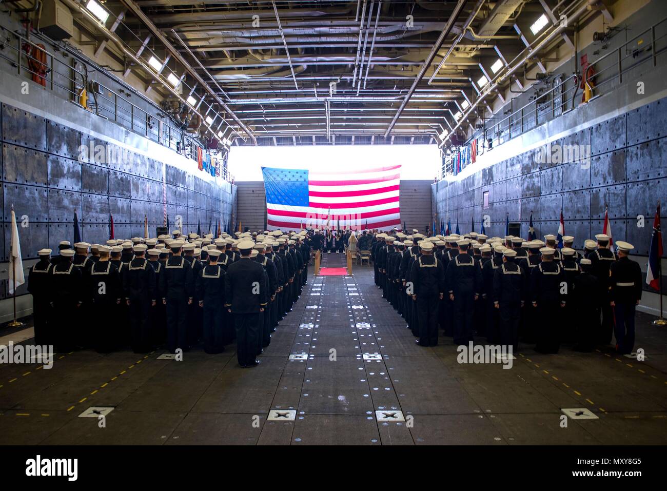 161216-N-GG858-041 SAN DIEGO (December 16, 2016) Sailors stand at ...