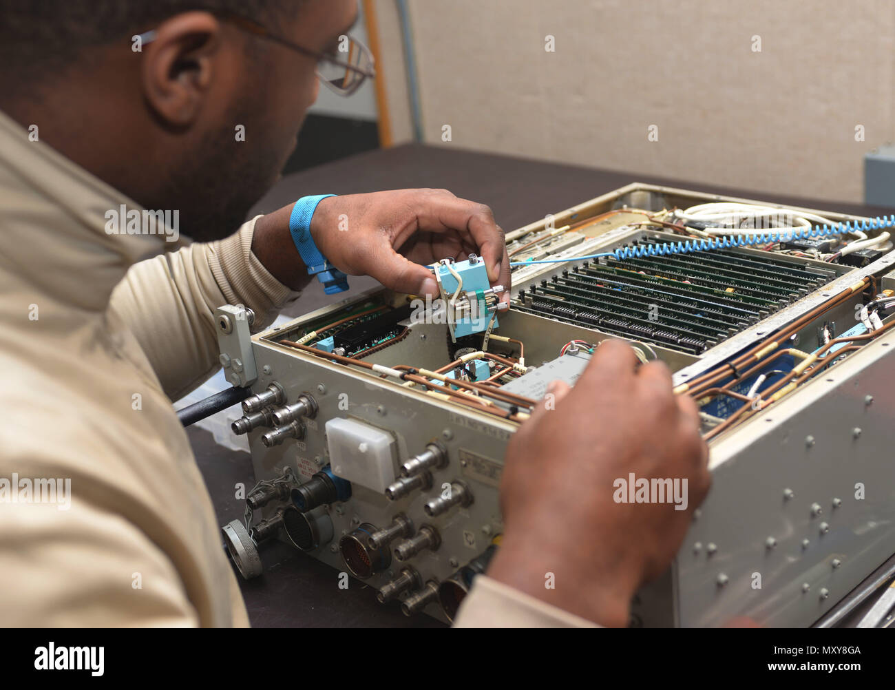 Airman 1st Class Terre Camille, an avionics technician assigned to the ...