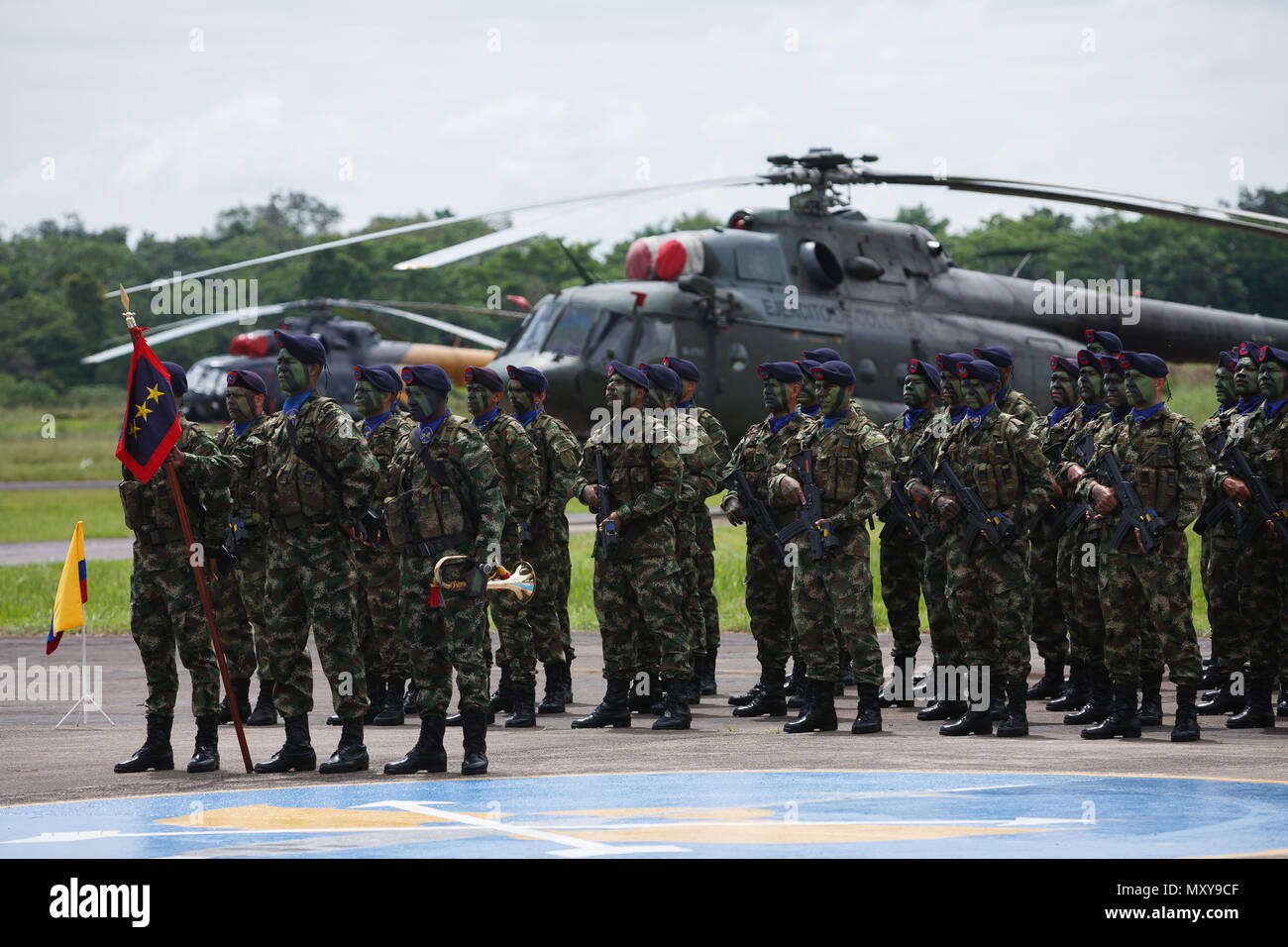 Colombian army soldiers stand at attention December 7, 2016 during a ...