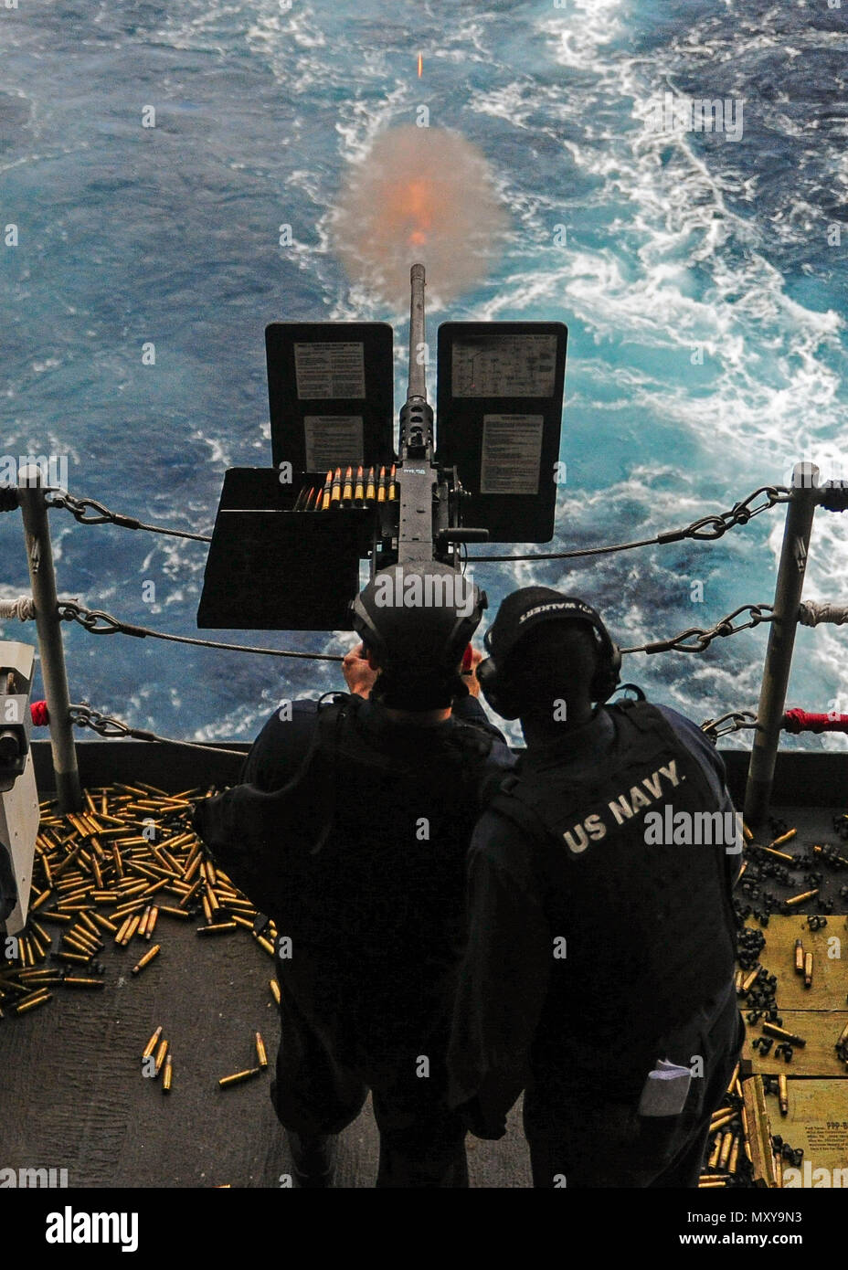 161215-N-VH385-564 ATLANTIC OCEAN (Dec. 15, 2016) A Sailor fires a .50 ...